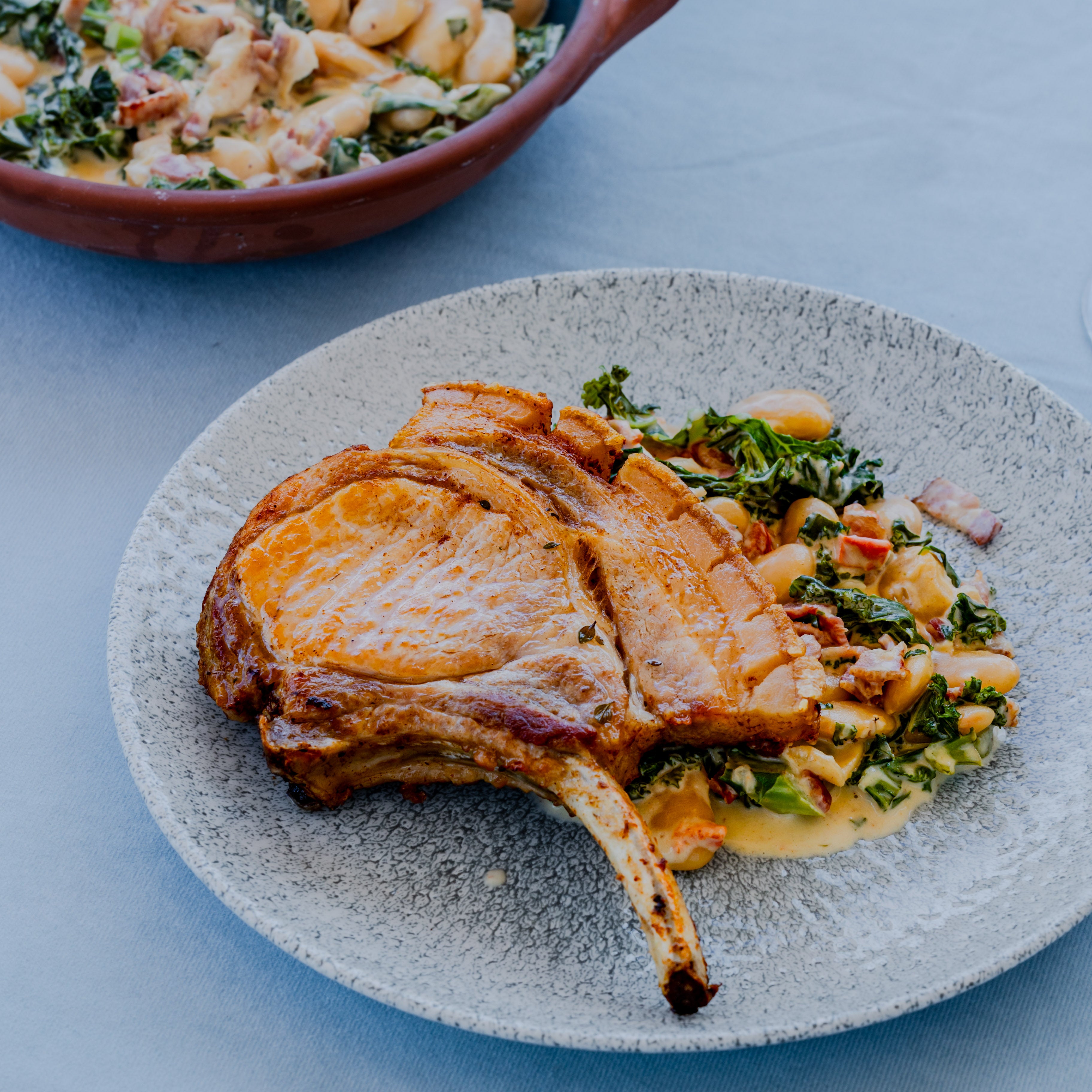 French Trimmed Pork Chops with Butter Beans, Kale and Bacon – DukesHill